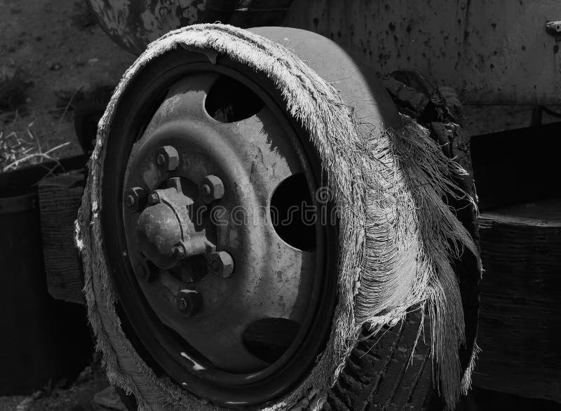 Blown Out Tire with Exploded, Shredded and Damaged Rubber Stock Photo ...