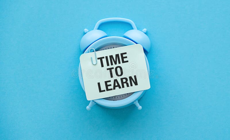 Blu Alarm Clock with Text Time To Learn on Blue Background. Stock Photo ...