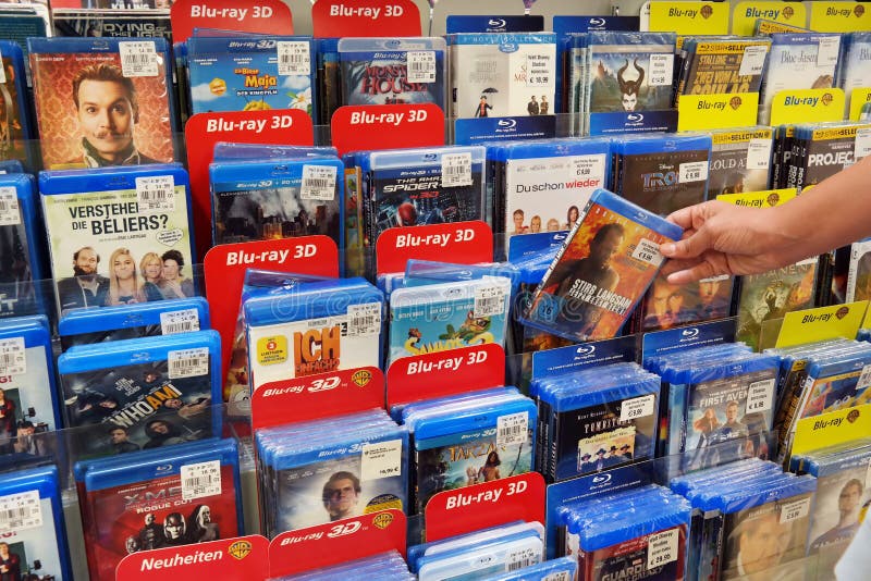 Blu-ray Discs and DVDs editorial stock photo. Image of media - 58570903