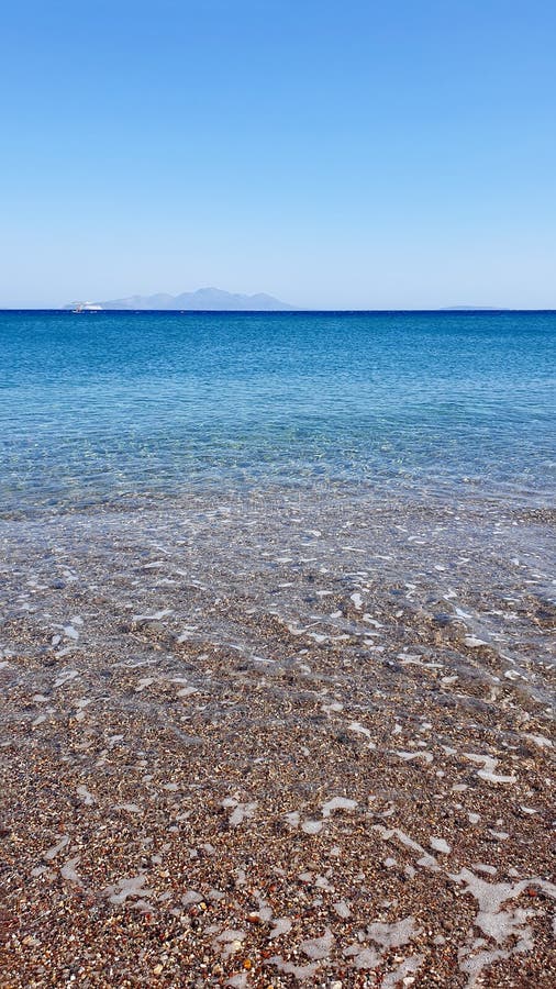 Blue Aegean Sea and Beach Background. Aqua Sea Water Surface. Sea ...
