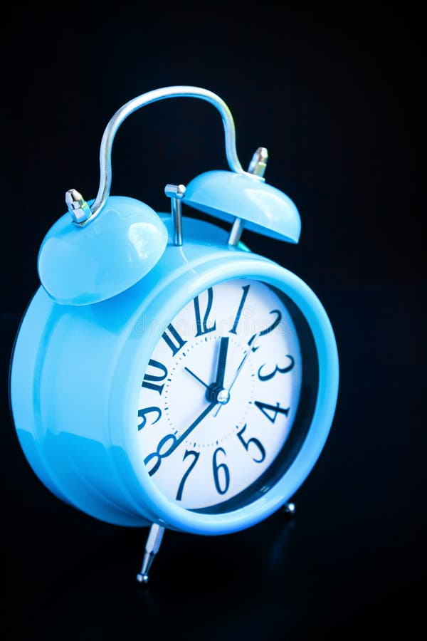 Blue Alarm Clock on Black Background Stock Photo - Image of ringing ...