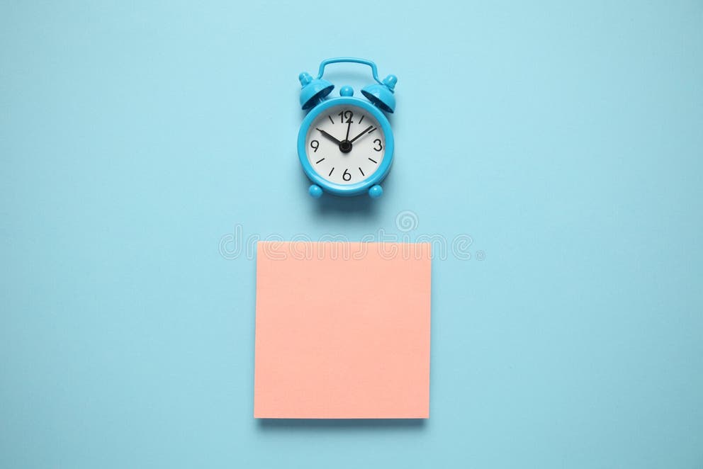 Blue Alarm Clock and a Reminder Note. Time Management Concept Stock ...