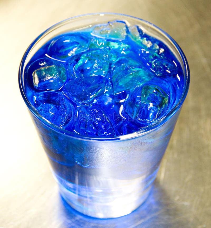 Blue alcohol cocktail stock image. Image of closeup, liquor - 34723399