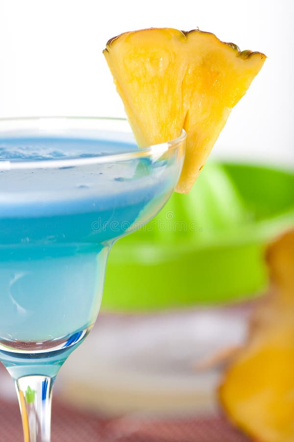 Blue Alcohol Cocktail with Pineapple and Cherry Stock Image - Image of ...