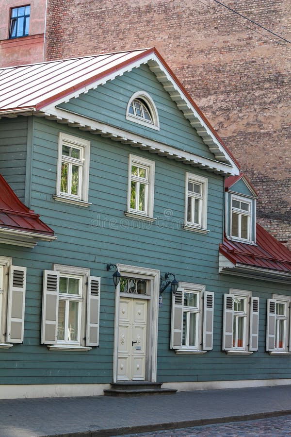 Blue, Antique Building with White Windows in a City Center Editorial ...