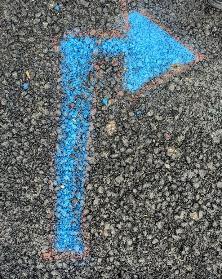 Blue Arrow Painted on Pavement Pointing Stock Photo - Image of drive ...