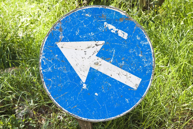 Blue Arrow Sign Isolated on White Background Hanging from a Rope ...