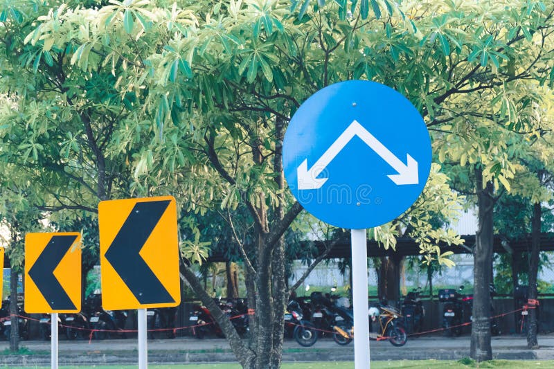 Blue Arrow Sign Indicating a Two Way Road Stock Photo - Image of travel ...