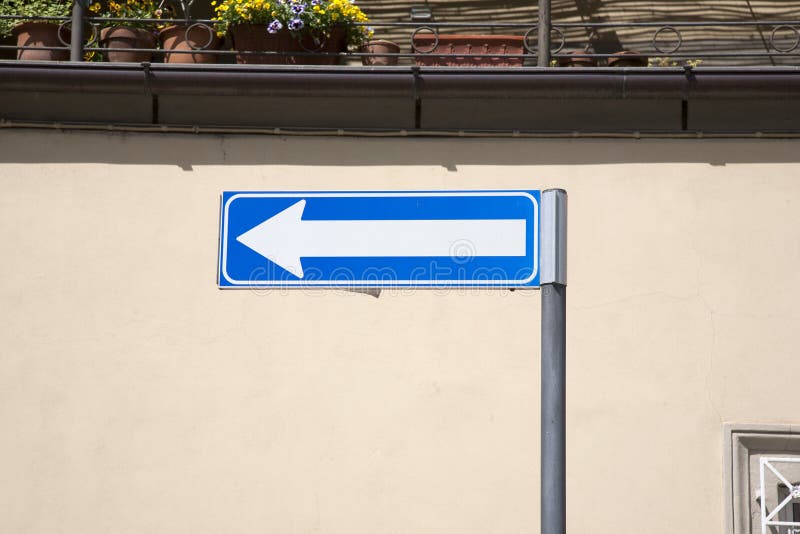 Blue Arrow Sign stock photo. Image of sign, wall, direction - 31063284