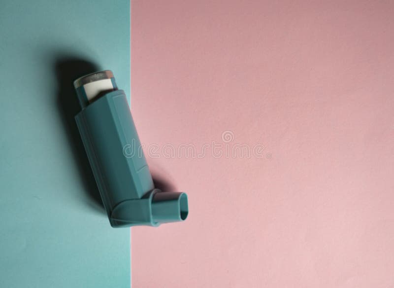 Blue Asthma Inhaler on a Pink and Blue Background Stock Image - Image ...