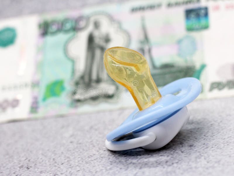 Blue Baby Pacifier on the Background of Russian Money Stock Photo ...