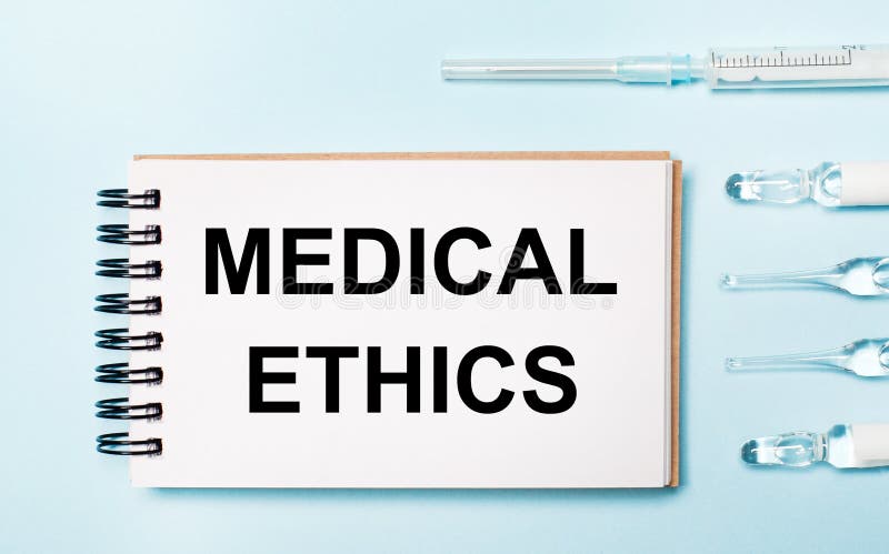 On a Blue Background Ampoule with Medicines and a Notebook with the ...