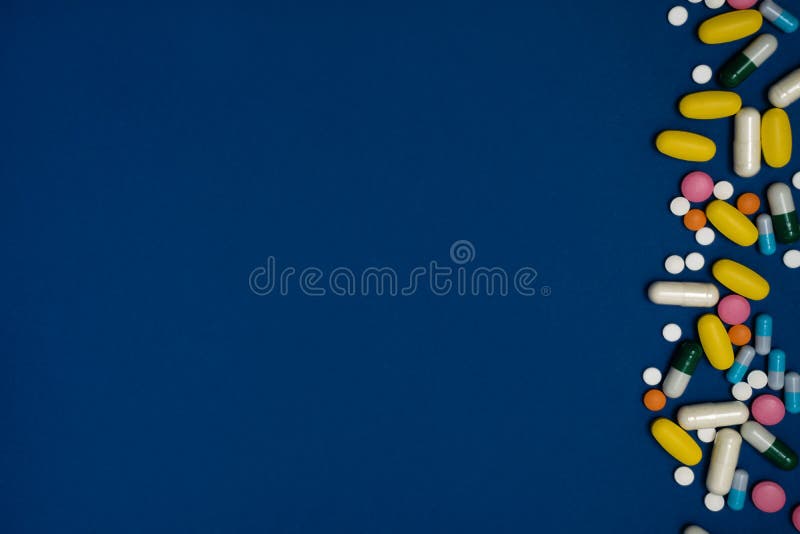 Excessive Intake of Drugs or Vitamins. Blue Background with a Variety ...