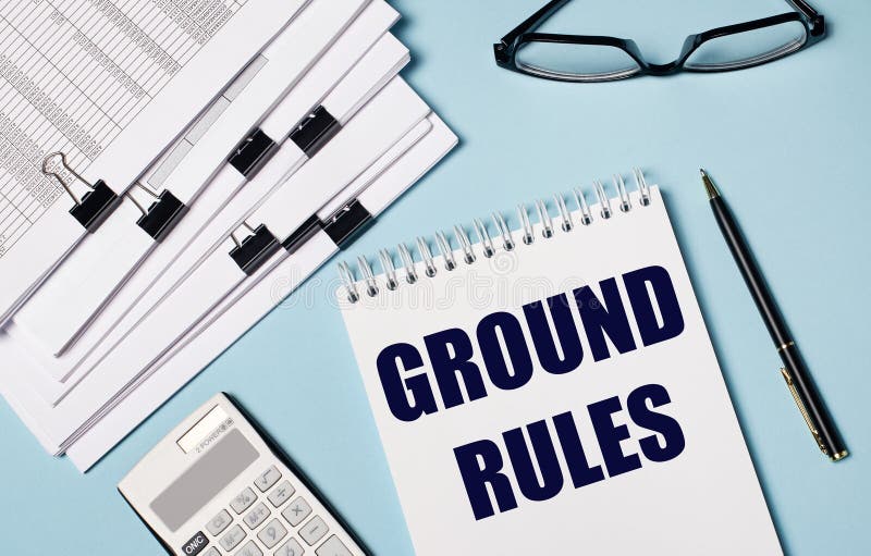 On a Blue Background - Documents, Glasses, a Calculator, a Pen and a ...