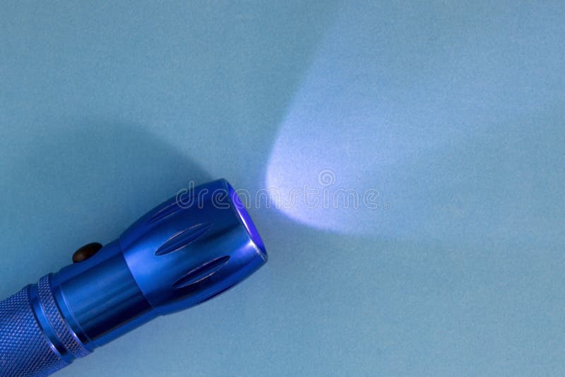 Blue Background with Flashlight on. Turned on Flashlight on a Blue ...