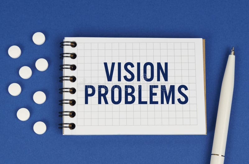 On a Blue Background, a Pen, Tablets and a Notepad with the Inscription ...