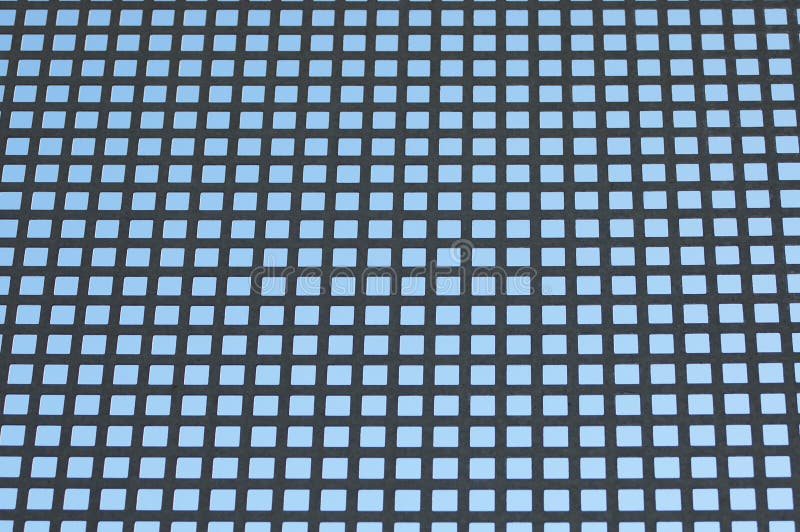 Blue Background, in the Photo a Metal Grid with Square Cells on a Blue ...