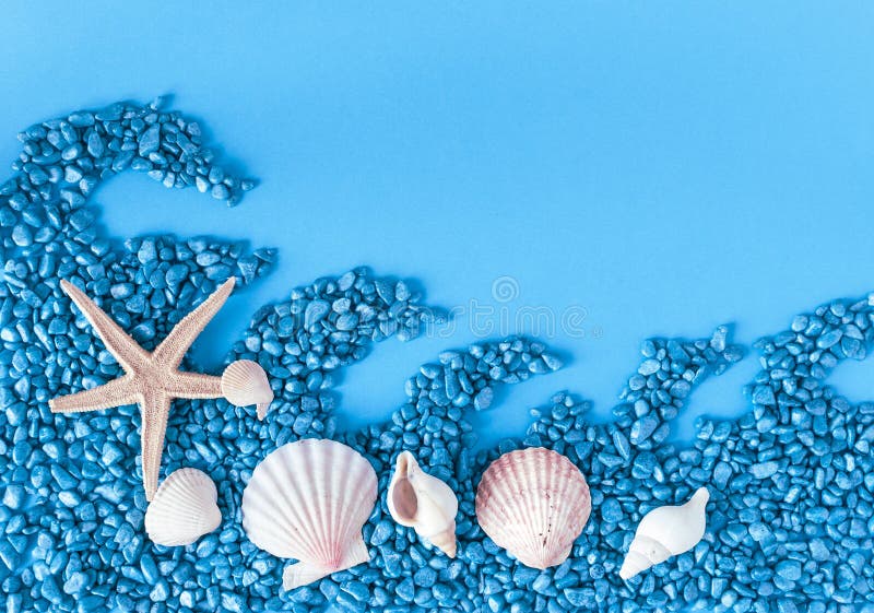 Blue Background with Small Decorative Pebbles and Shells. Stock Image ...