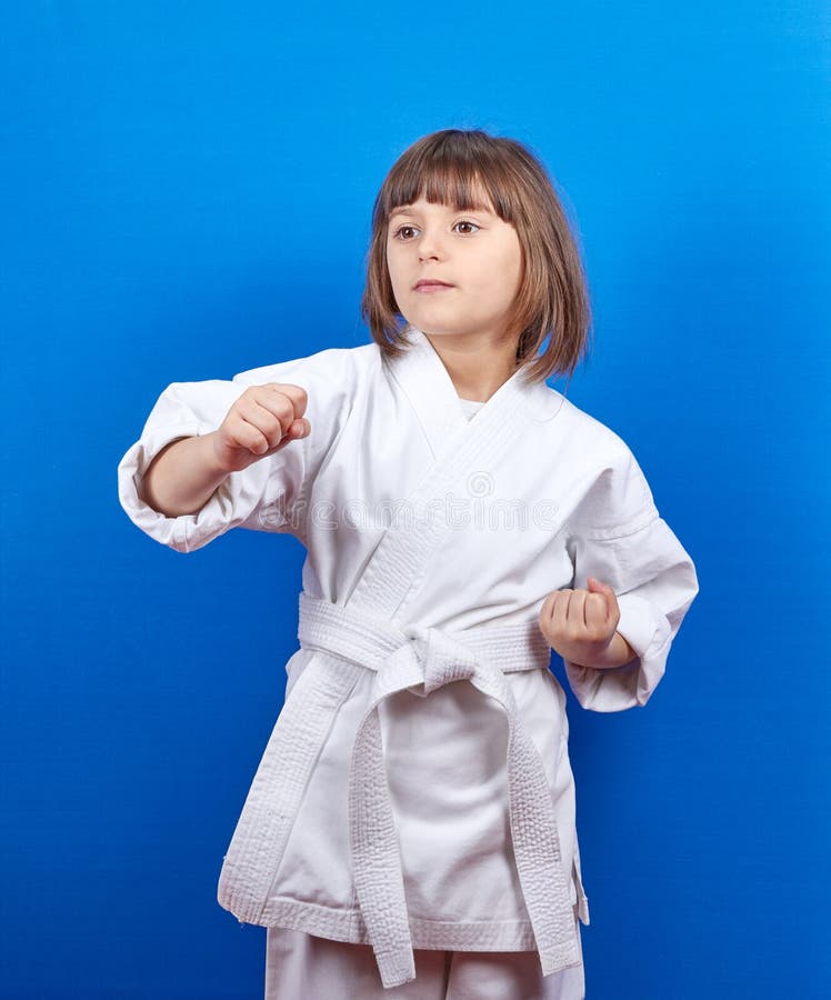 On a Blue Background Sportswoman Beats Punch Arm Stock Image - Image of ...