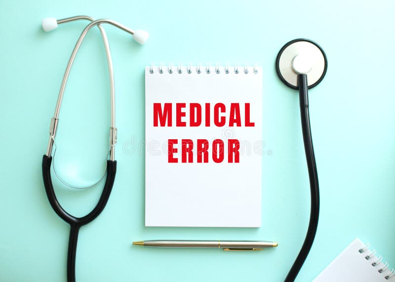On a Blue Background, a Stethoscope and a White Notepad with the Red ...