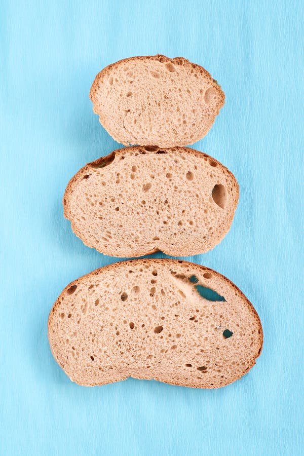 Blue Background. Three Slices of Bread Stock Photo - Image of rough ...