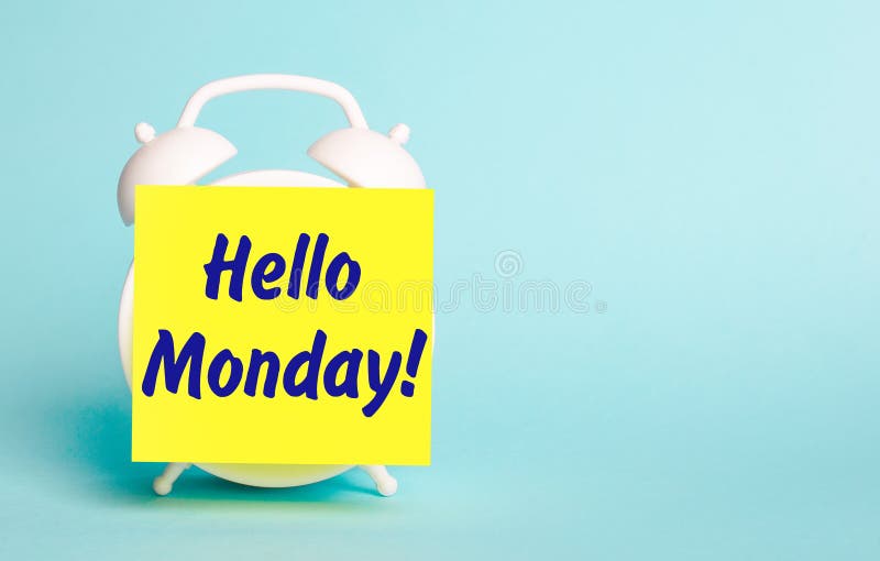 On a Blue Background - a White Alarm Clock with a Yellow Sticker for ...