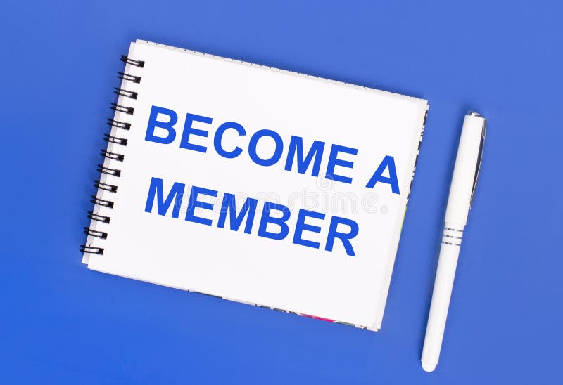 On a Blue Background, a White Ballpoint Pen and a White Notepad with ...