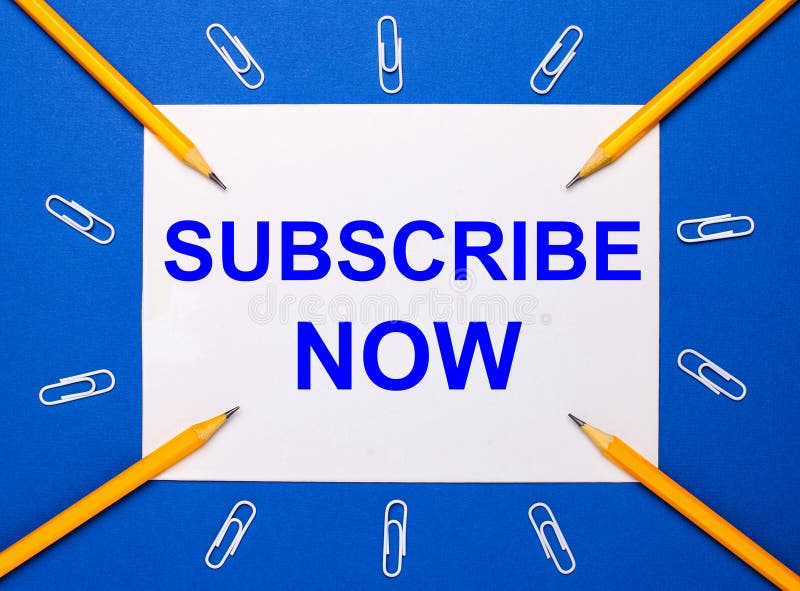 On a Blue Background, White Paper Clips, Yellow Pencils and a White ...