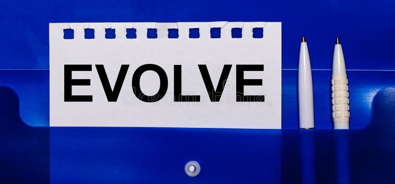 On a Blue Background, White Pens and a Sheet of Paper with the Text ...