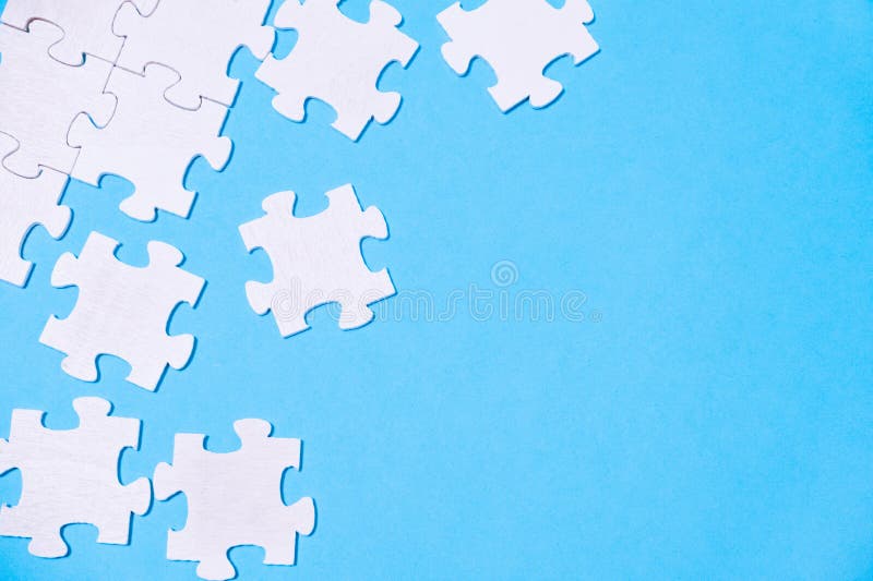 Blue Background with White Puzzle Pieces Scattered Across it Stock ...