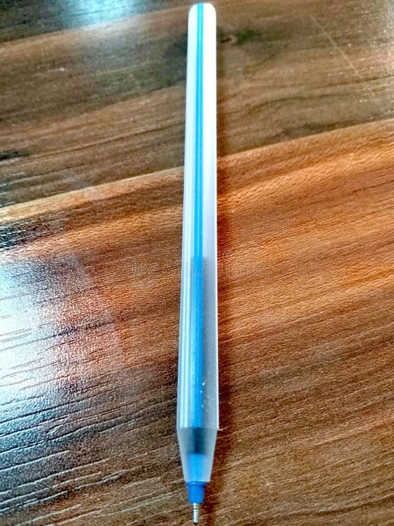 Blue ballpoint pen on desk stock photo. Image of ballpoint - 162255256