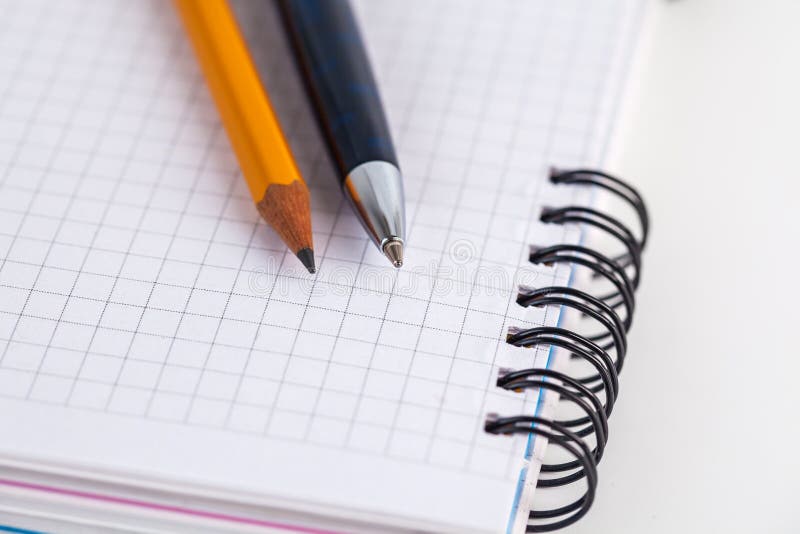 Blue Ballpoint Pen and Pencil on the Notebook Stock Photo - Image of ...
