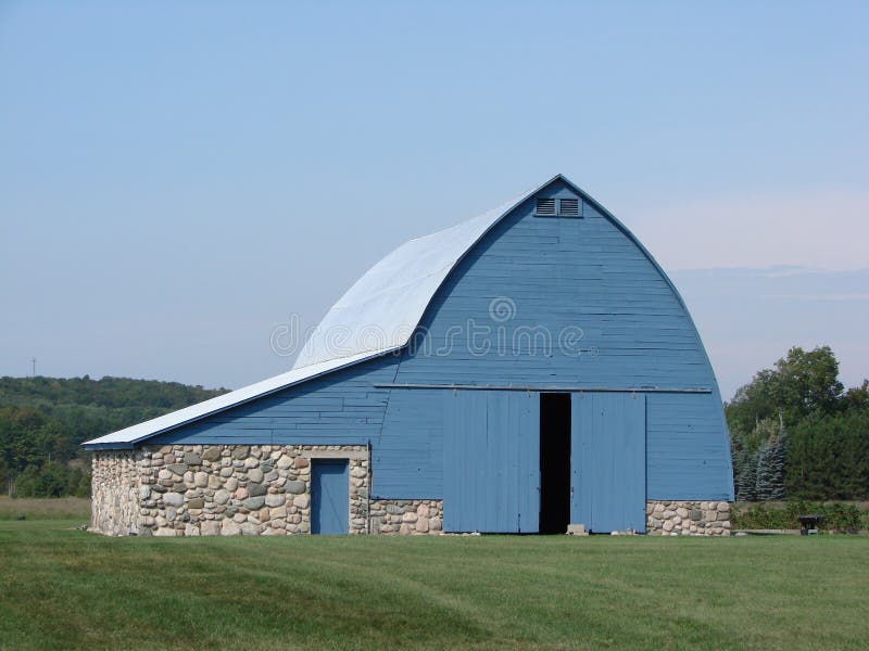 Blue Barn with Stone Foundation Stock Photo - Image of metal, stone ...