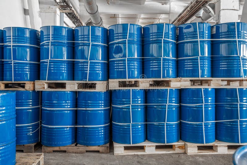 Blue Barrels In The Warehouse On Pallets Stock Photo - Image of ...