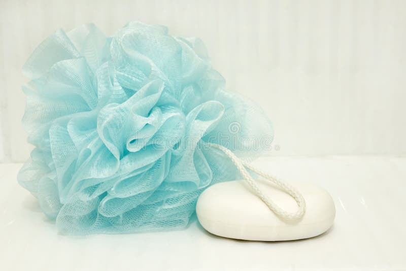 Blue bath puff and soap stock image. Image of light, background - 23812365