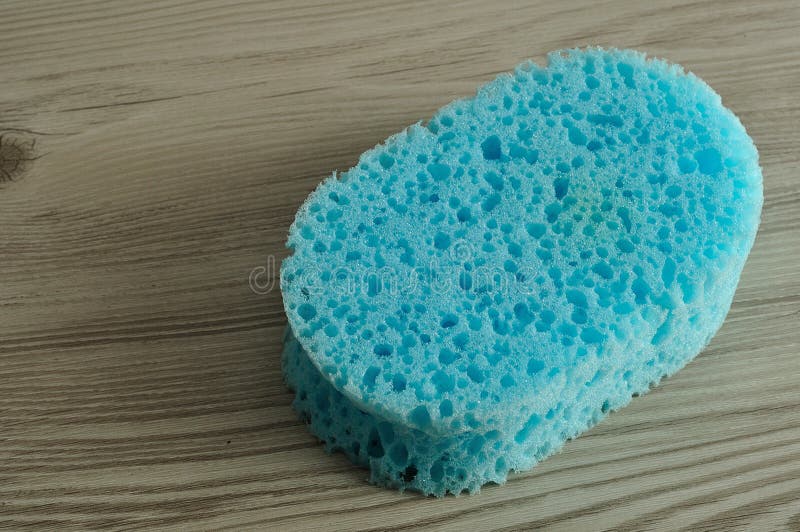 A Blue Bath Sponge and a Bar of Soap Stock Image - Image of blue ...