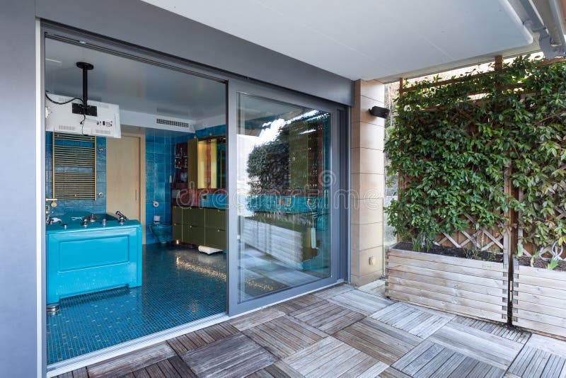 Blue Bathroom with Jacuzzi and Television Stock Photo - Image of house ...
