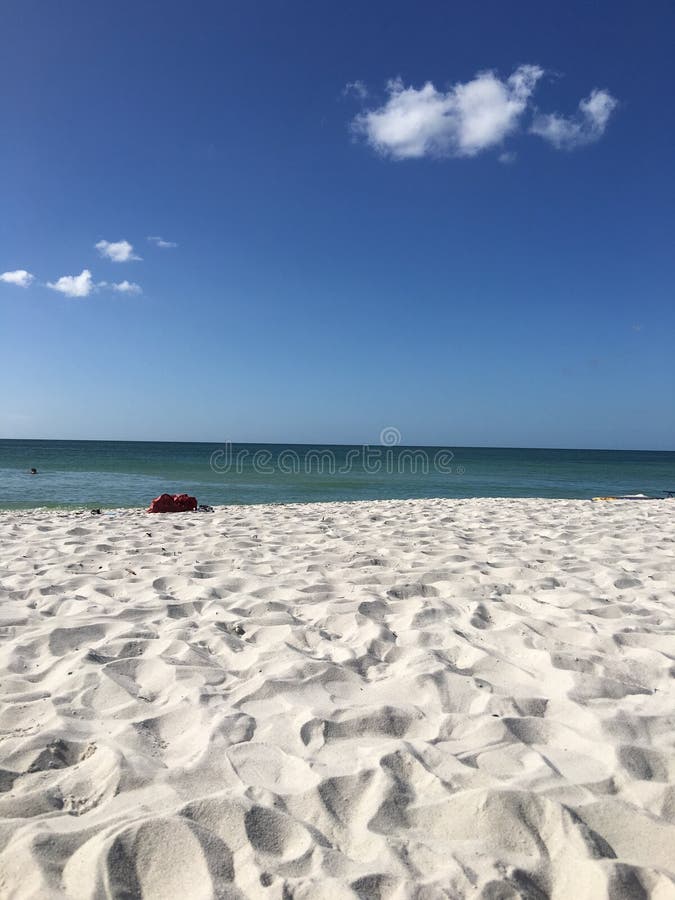 Blue Beach Scene with Clouds Stock Photo - Image of warm, blue: 71099670