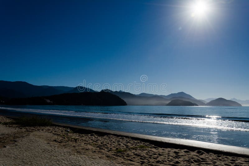 Blue Beach Under a Blue Sky Stock Photo - Image of praia, brazil: 93069292