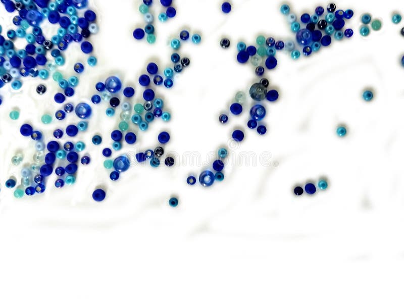 Blue Beads Scattered on White Background Stock Photo - Image of ...