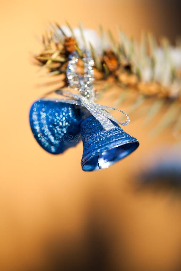 Blue Bells Christmas Decoration Hanging on Snowy Tree Stock Image ...