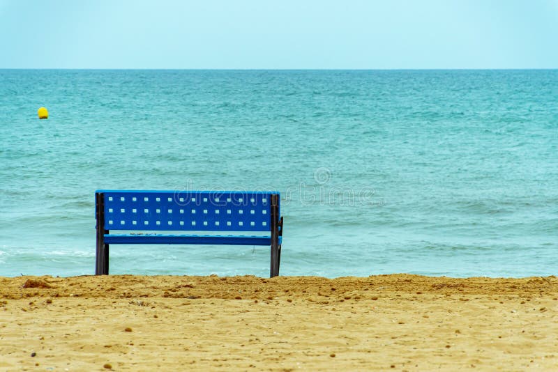 Blue Bench Facing the Sea on a Beach in Alicante. Spain Stock Image ...
