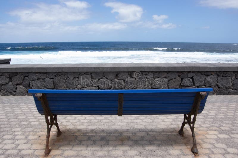 A Blue Bench in Front of the Sea Stock Photo - Image of bench, ocean ...