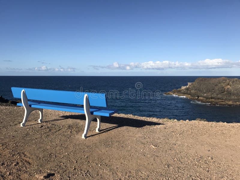 A Blue Bench Overlook the Sea Stock Photo - Image of tropical, horizon ...