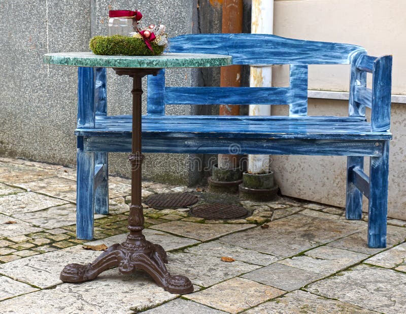 Blue Bench and a Table Outside a Cafe Stock Photo - Image of design ...