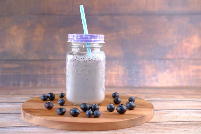 Blue Berry Milk Shake in a Glass on Table Stock Photo - Image of blue ...