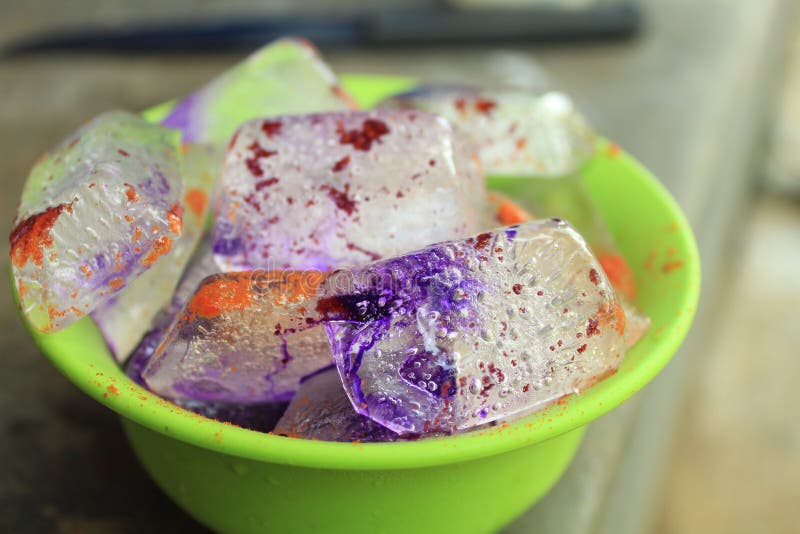 Ice Cube Experiment with Blue and Red Color , Focused Solid Ice Stock ...