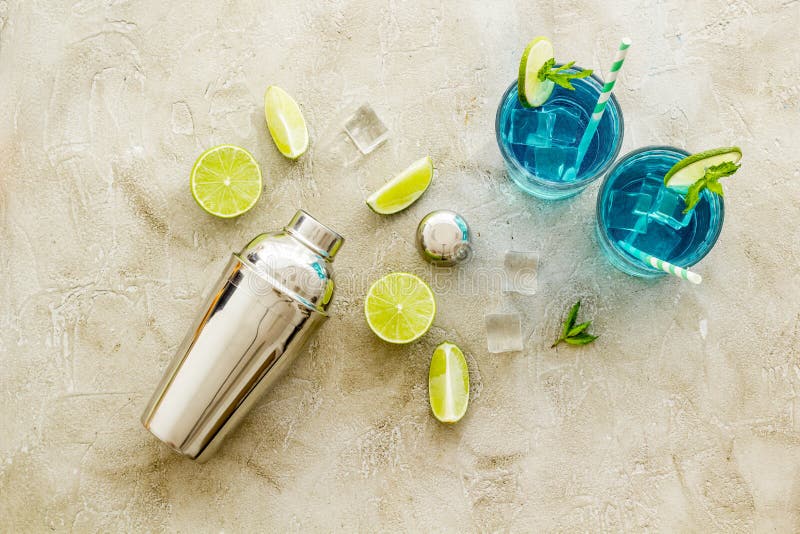 Blue Beverage, Iced Alcohol Cocktail Drink with Lime and Mint, Top View ...