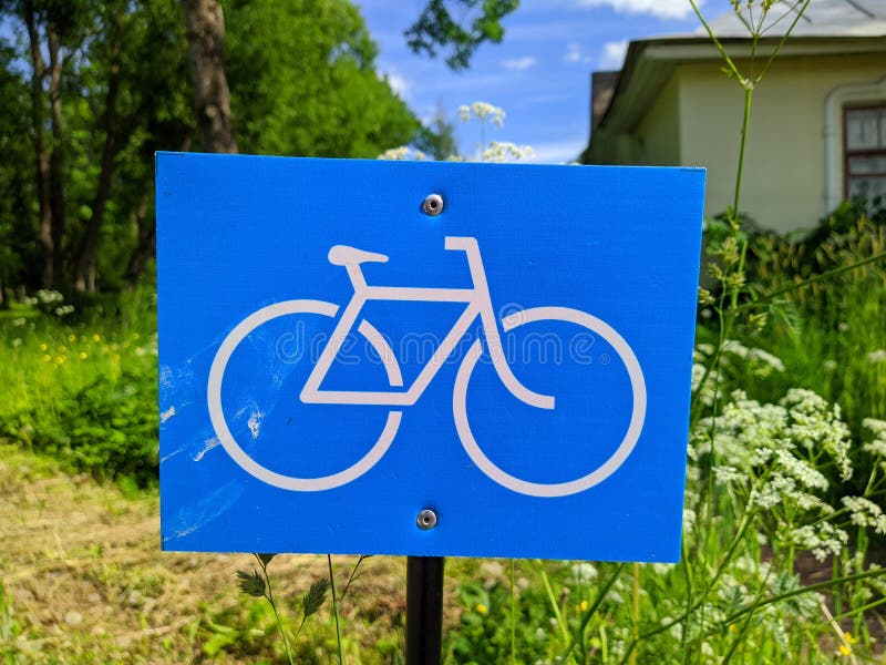 Blue Bicycle Parking Sign in the Park. Stock Image - Image of empty ...
