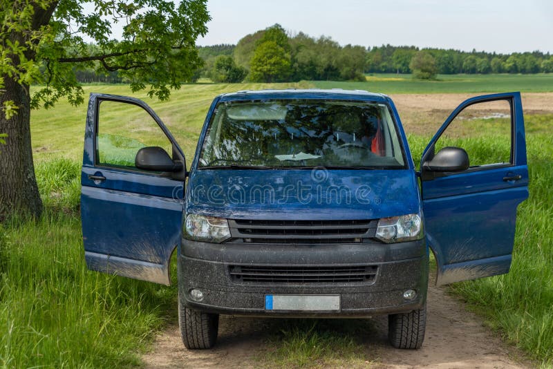 Blue Big Van on Path in Green Spring Nature Stock Photo - Image of ...